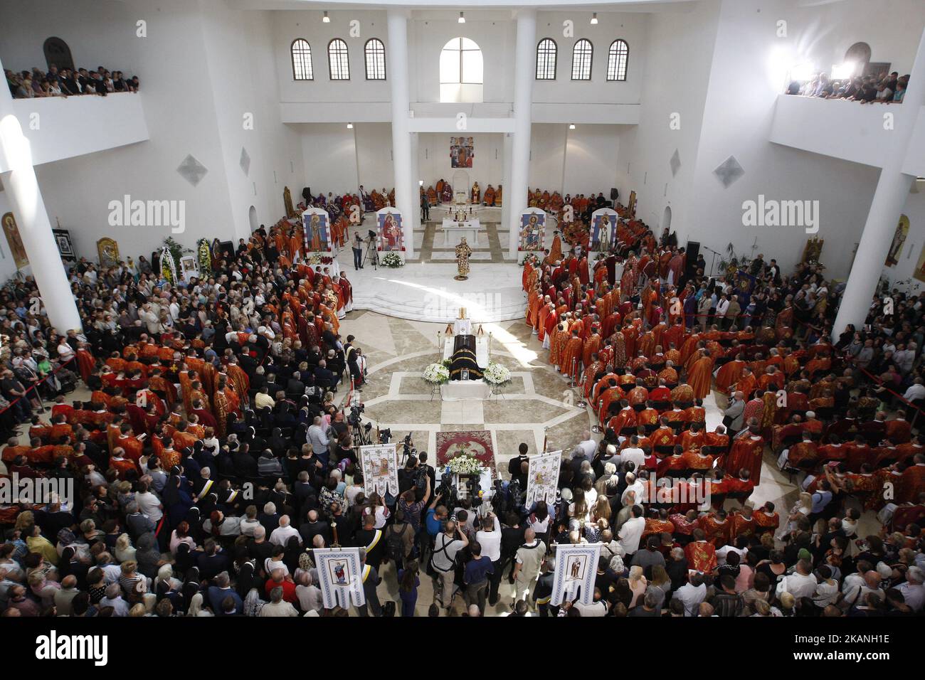 Greek Catholic priests and believers attend the funeral ceremony of ...