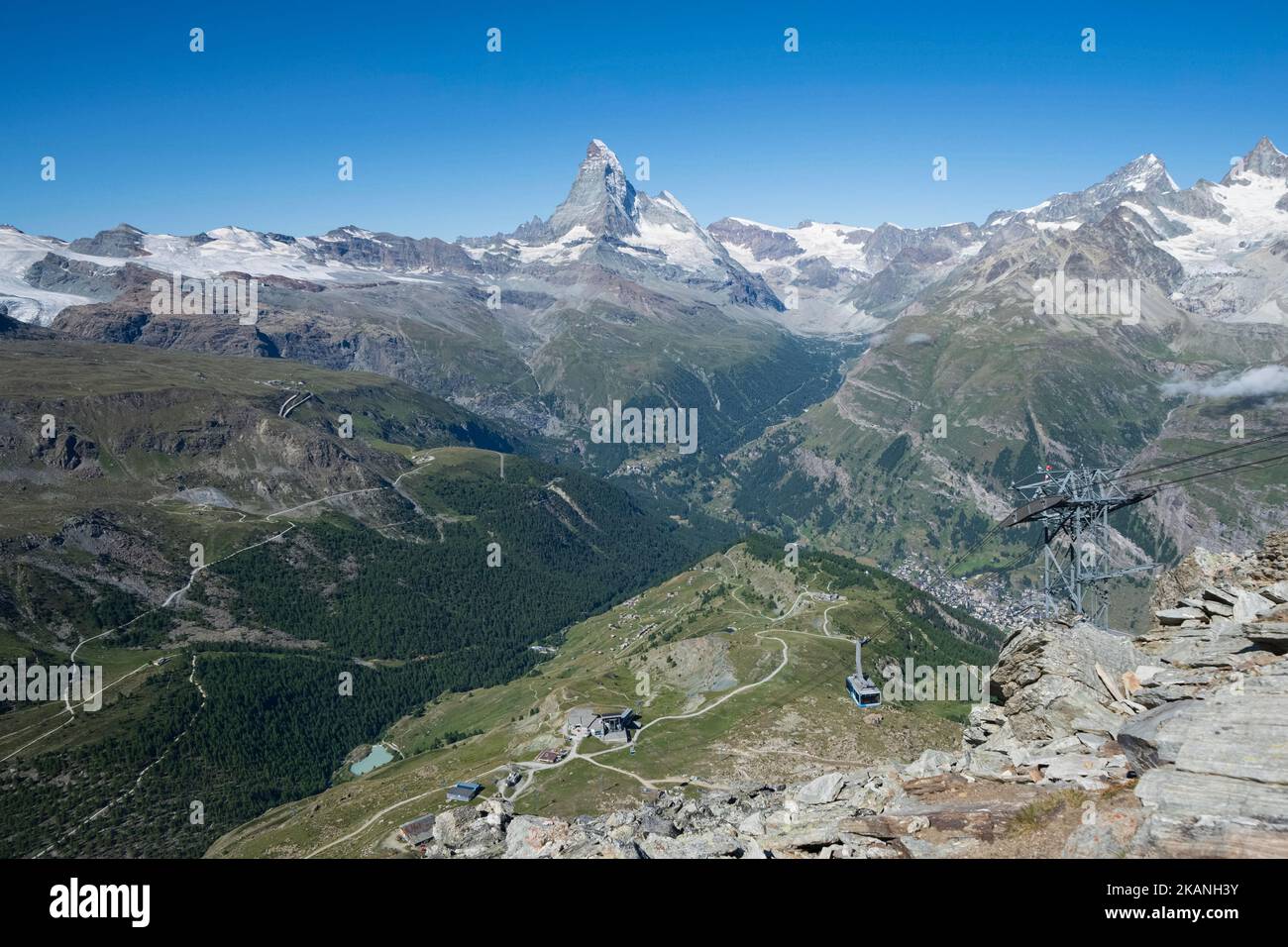 An aerial view of the iconic Matterhorn Mountain and cable cars over ...