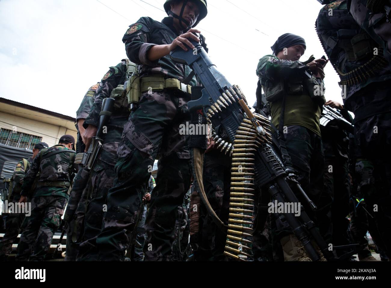 Striking force of the Philippine National Police or RPSB listens to ...