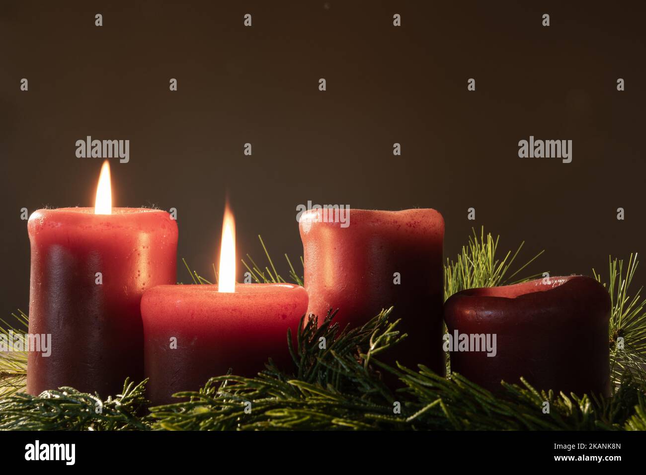 Advent wreath with red candles with two candles lit for the second week ... Advent wreath with red candles with two candles lit for the second week ...