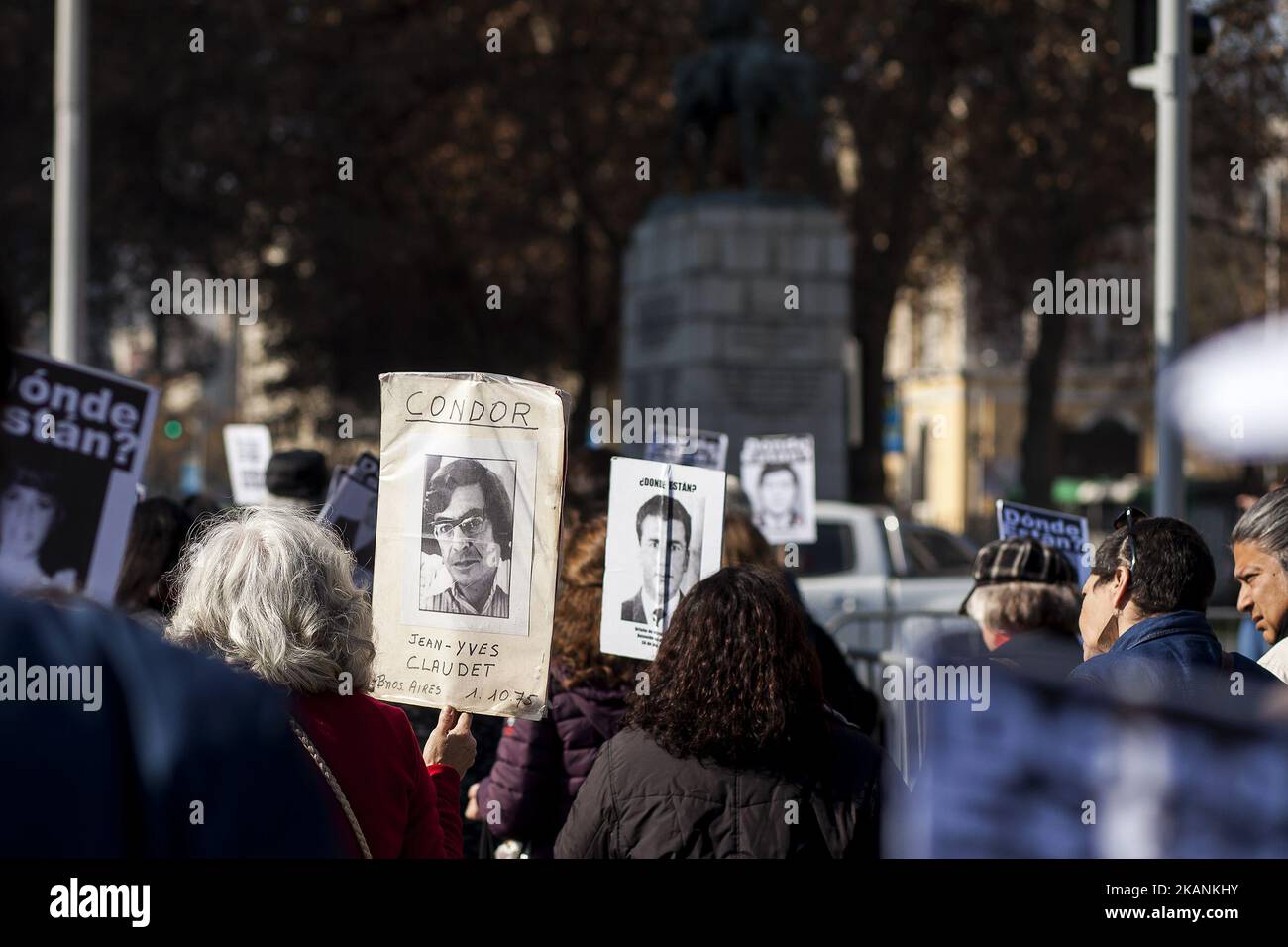 Santiago, Chile. 9 June 2017. Protesters carry posters with photographs ...
