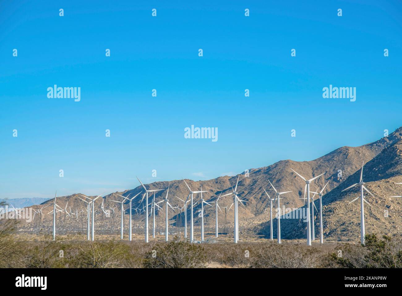 Palm Springs, California- Windmills on a shrubland near the mountain ...