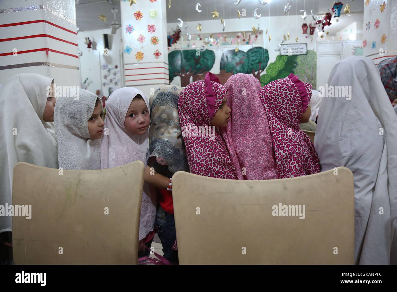 Syrian girls prepare to read Azkar (reciting prayers) and Koran as part ...