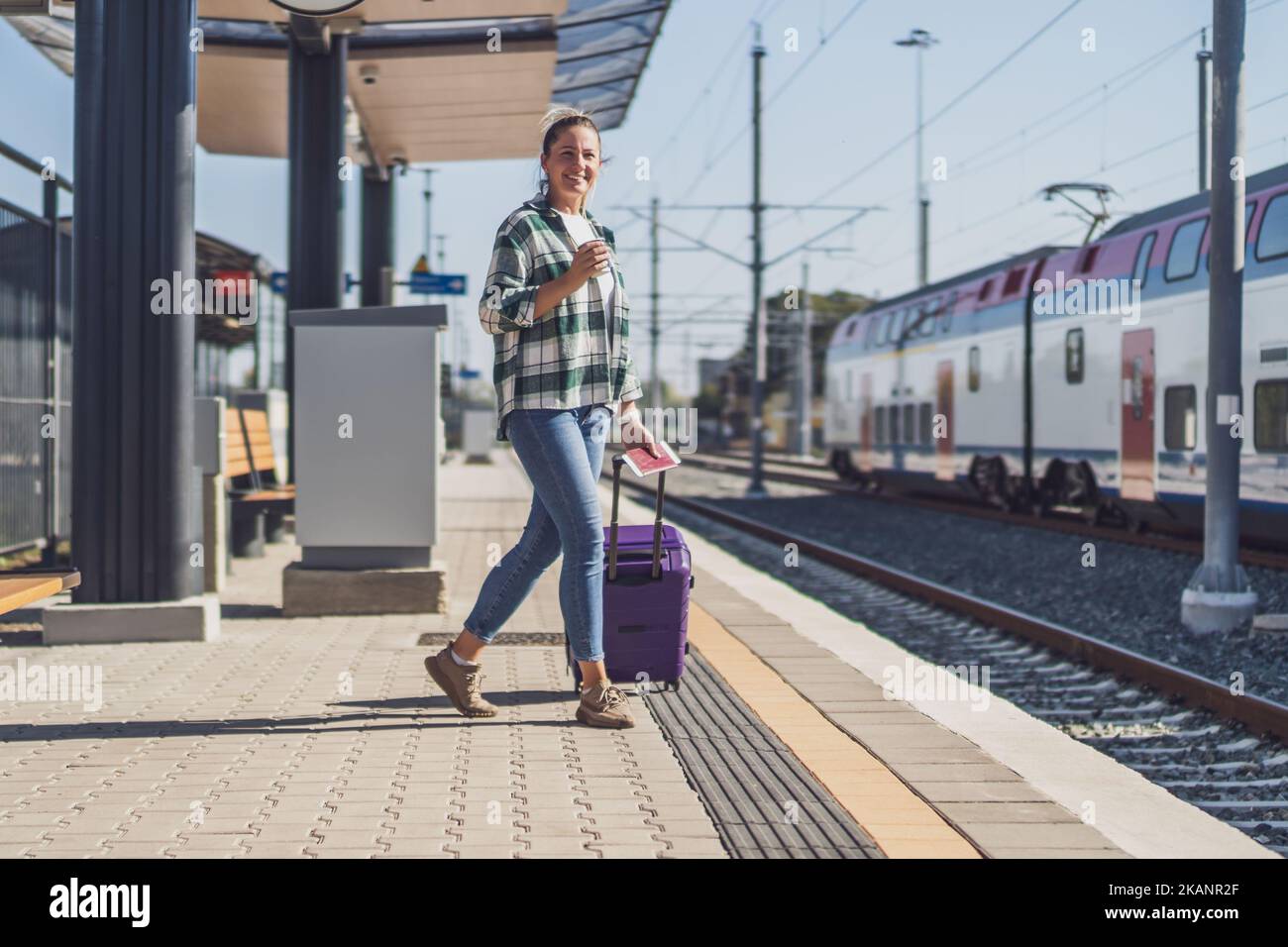Woman train platform ticket hi-res stock photography and images - Alamy