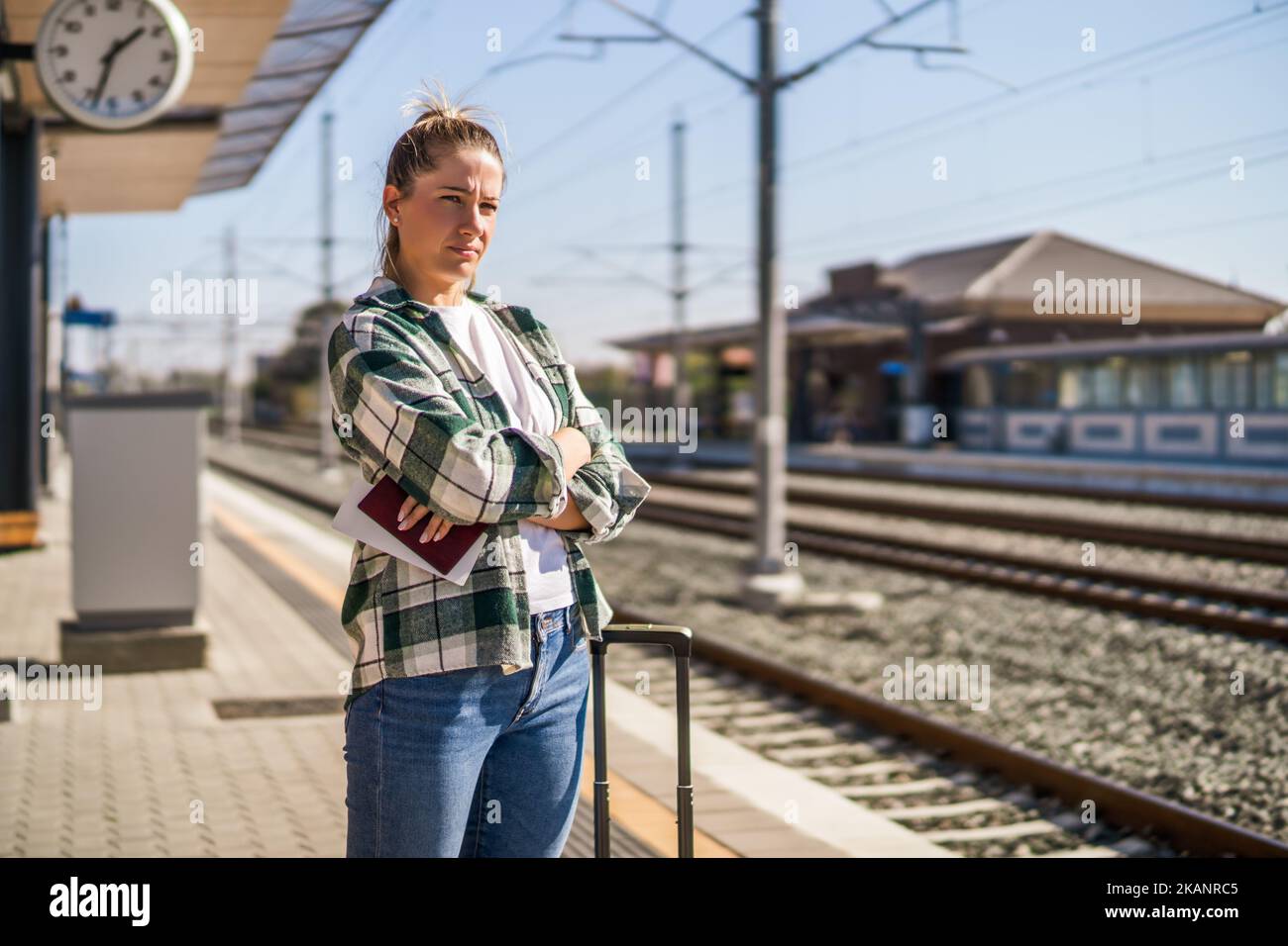 Woman railway station worried hi-res stock photography and images - Alamy