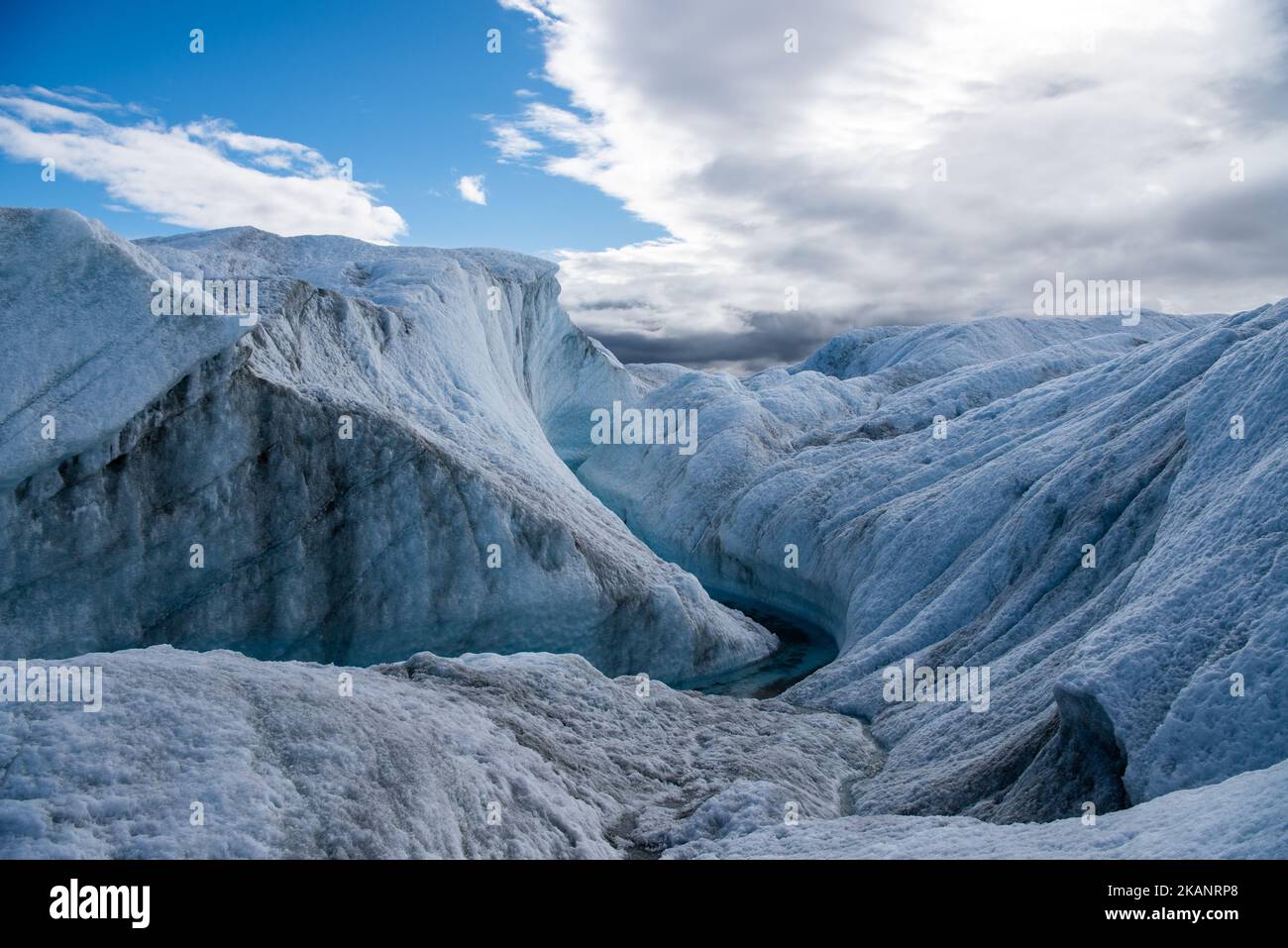 A beautiful view of ice-frozen areas in polar zones under a blue sky ...