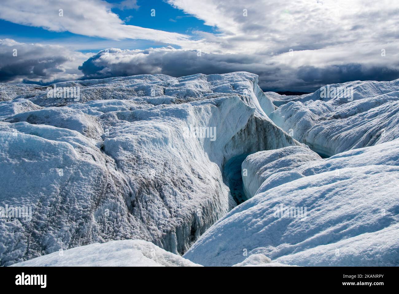 A beautiful view of ice-frozen areas in polar zones under a blue sky ...
