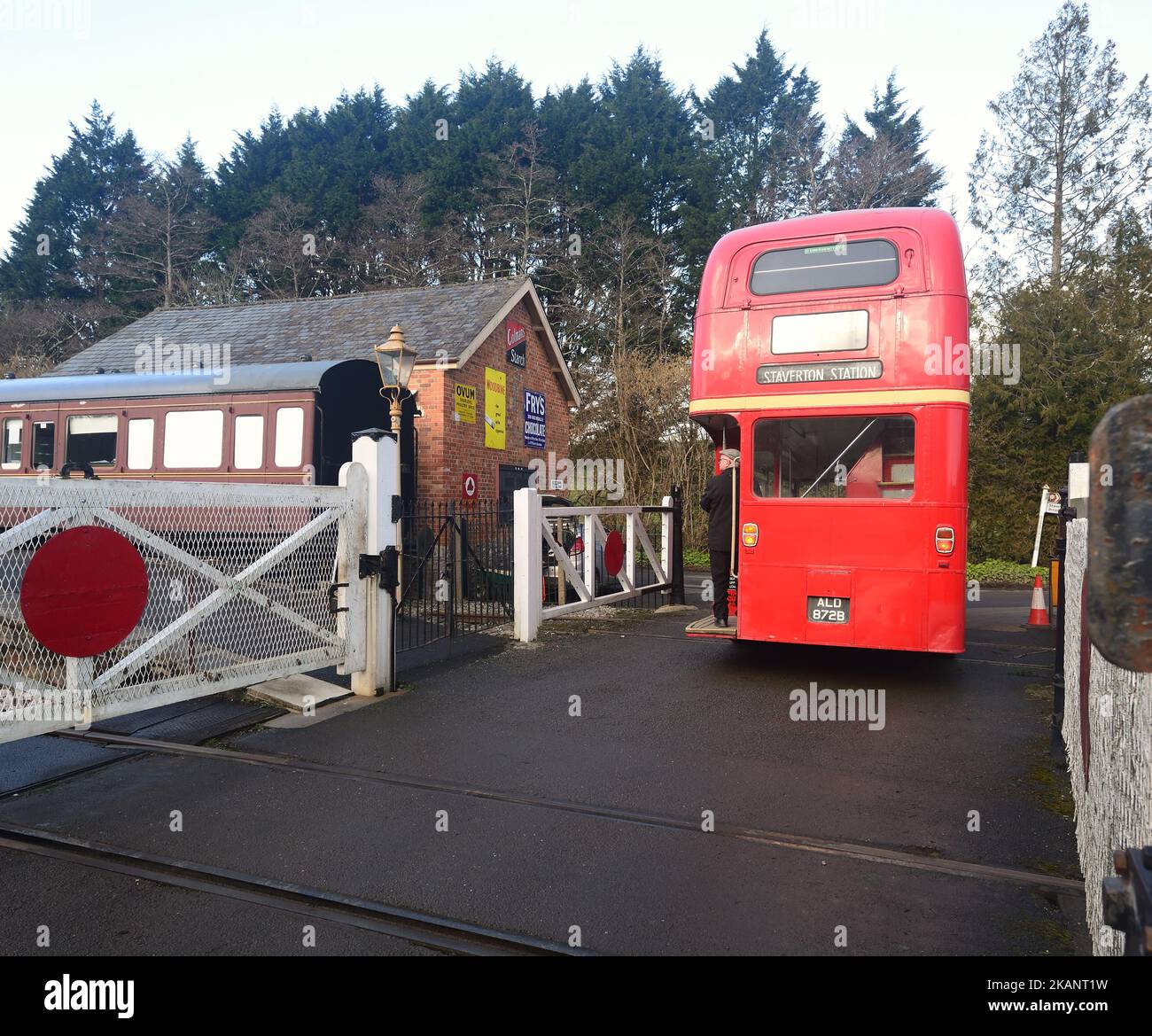 Vintage Routemaster double-decker bus on the level crossing at the ...