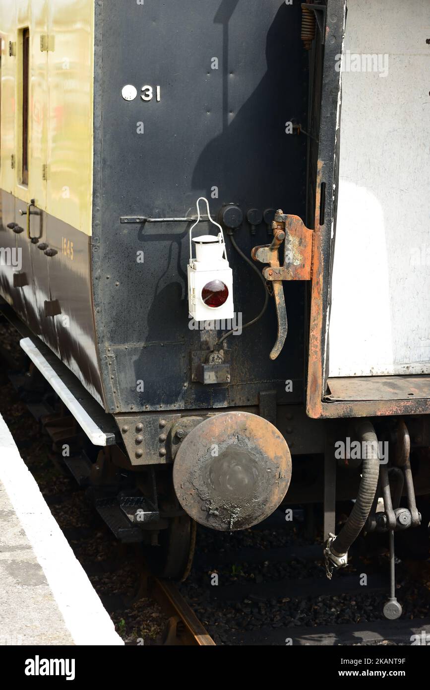 Tail-lamp on the rear coach of a train at Totnes Riverside station on ...
