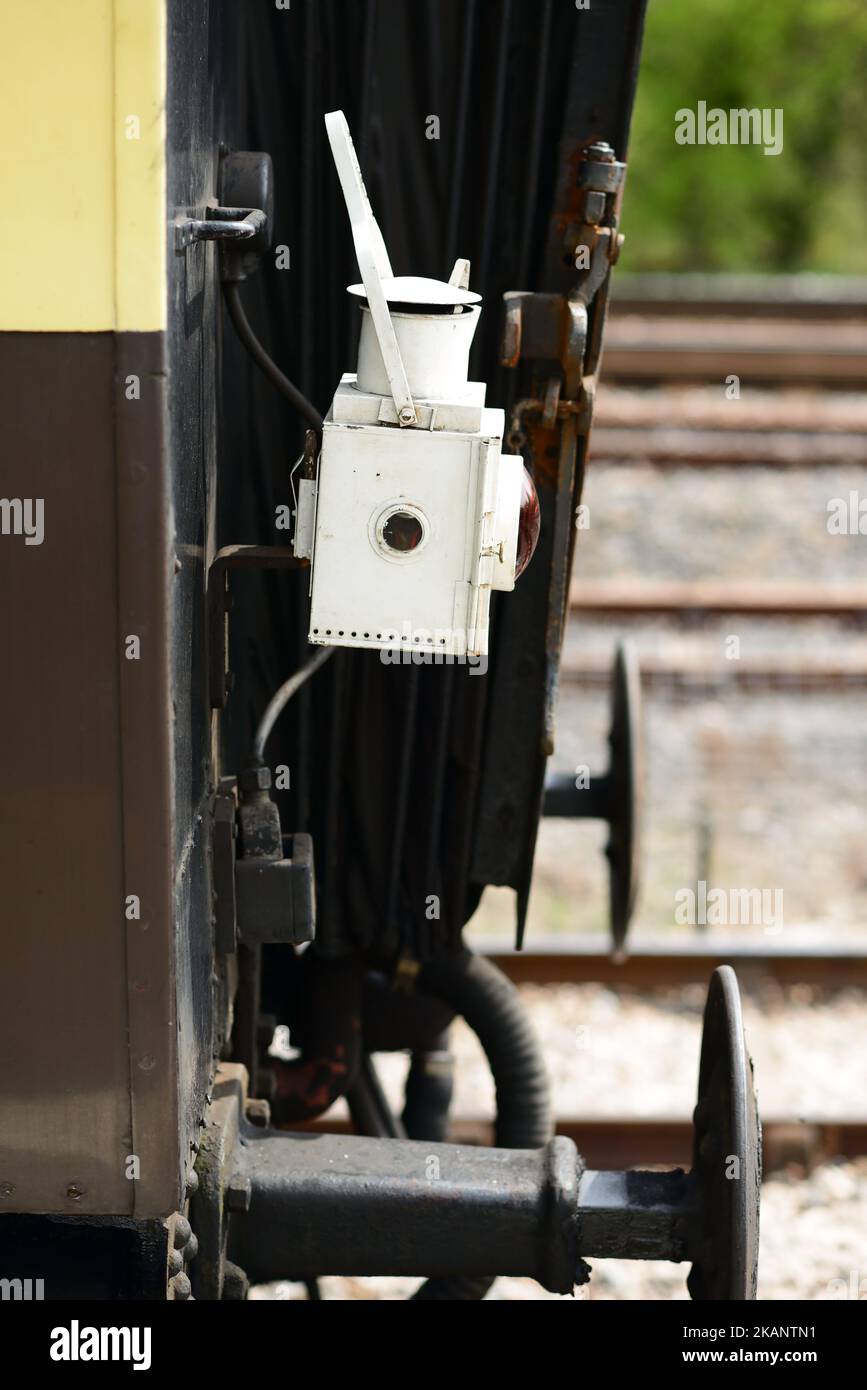 Tail-lamp on the rear coach of a train at Totnes Riverside station on ...