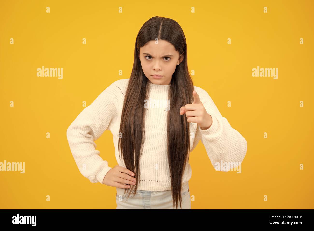 Teen girl pointing finger at camera, point index finger camera on you ...
