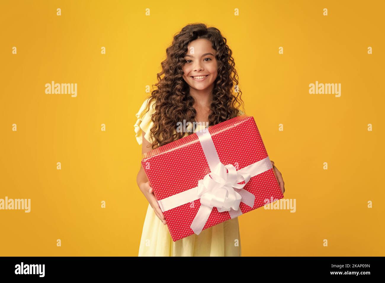 Happy teenager portrait. Teenager kid with present box. Teen girl ...