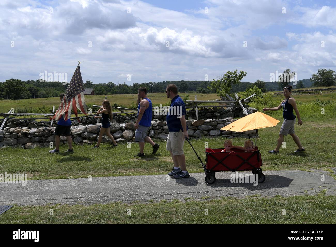 Members of patriotic groups assemble for a rally in reaction to a ...