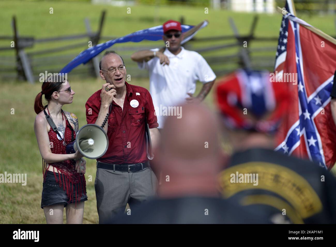 Members of patriotic groups assemble for a rally in reaction to a ...