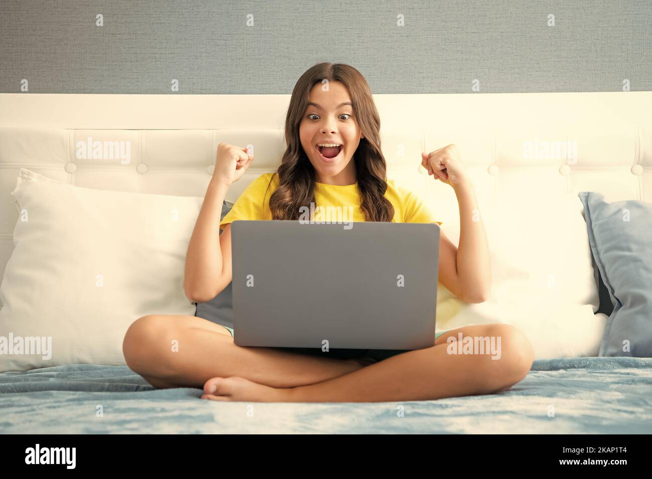 Expressive emotional excited teen girl. Teenager child girl working on ...