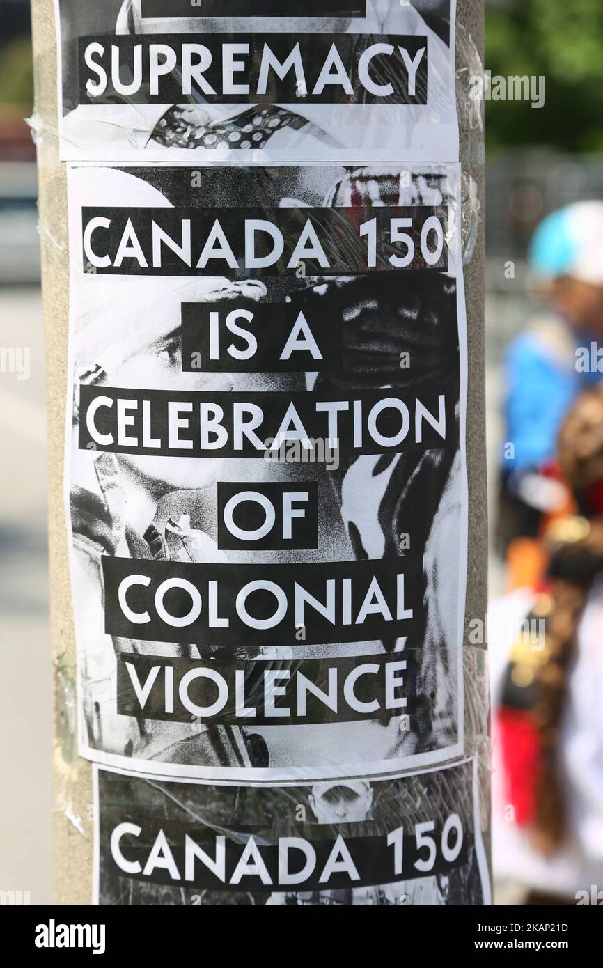 Posters protesting Canada Day and the 150th anniversary of ...