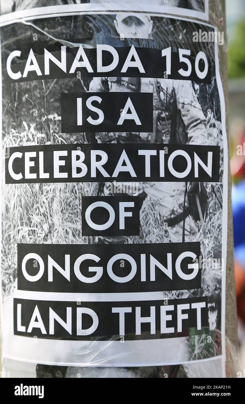 Posters protesting Canada Day and the 150th anniversary of ...