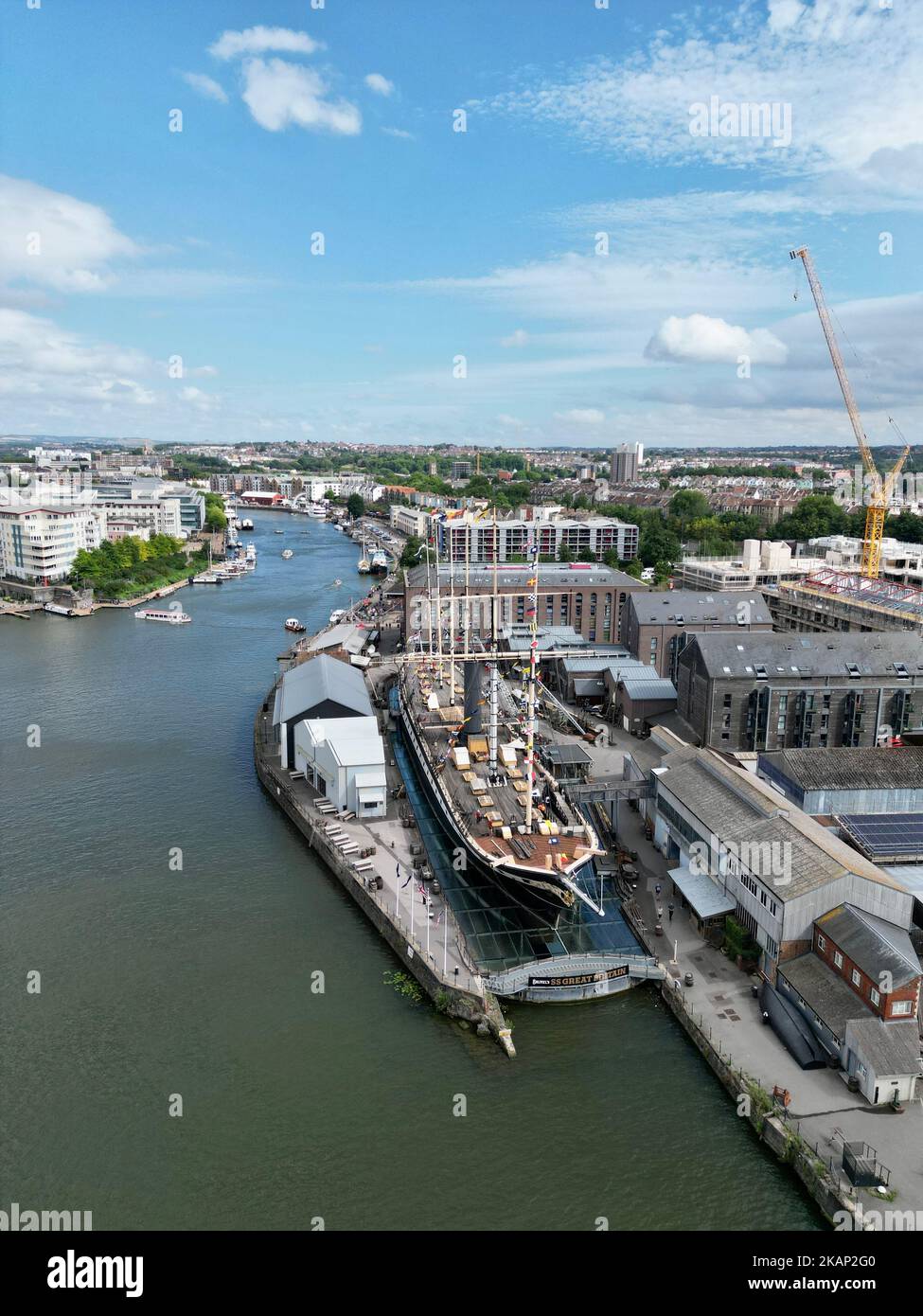 An aerial view of Bristol with a river and dense buildings, England ...