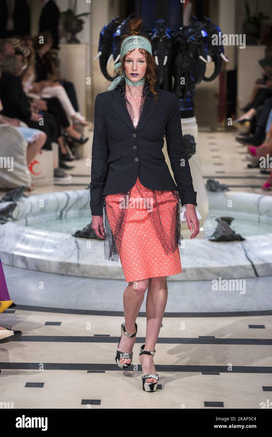 A model runs the runway at Anja Gockel fashion show during Mercedes ...