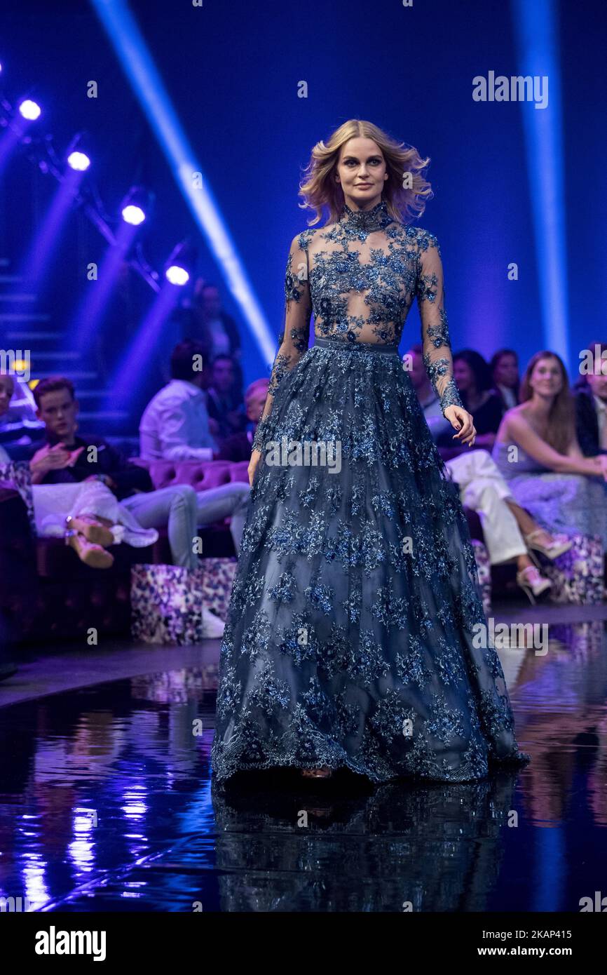 A model runs the runway during Guido Maria Kretschmer Spring/Summer ...