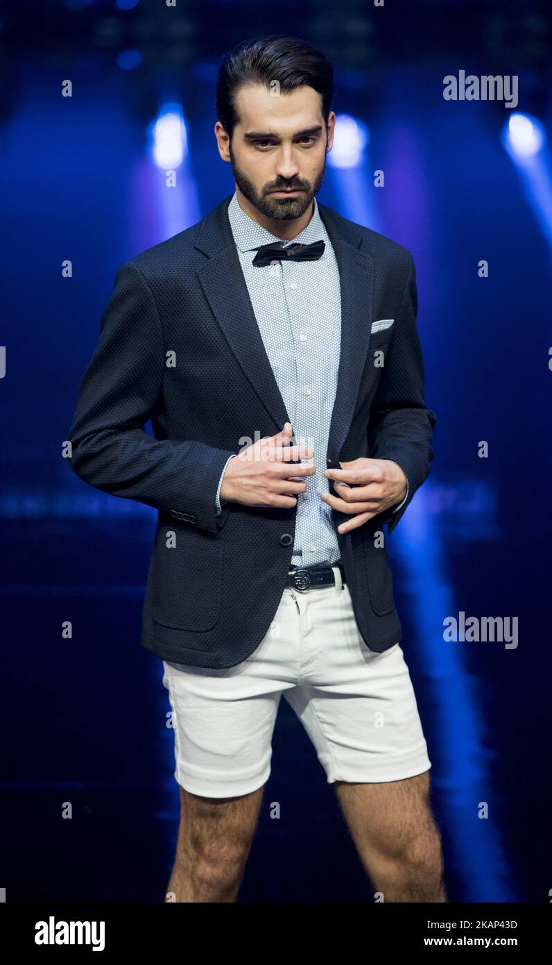 A model runs the runway during Guido Maria Kretschmer Spring/Summer ...