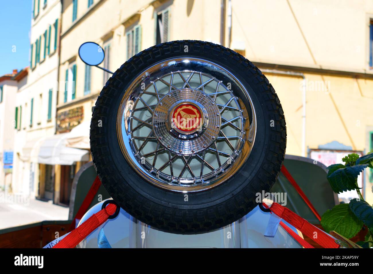 spare wheel with studs from the Viganò company on a vespa, an Italian ...