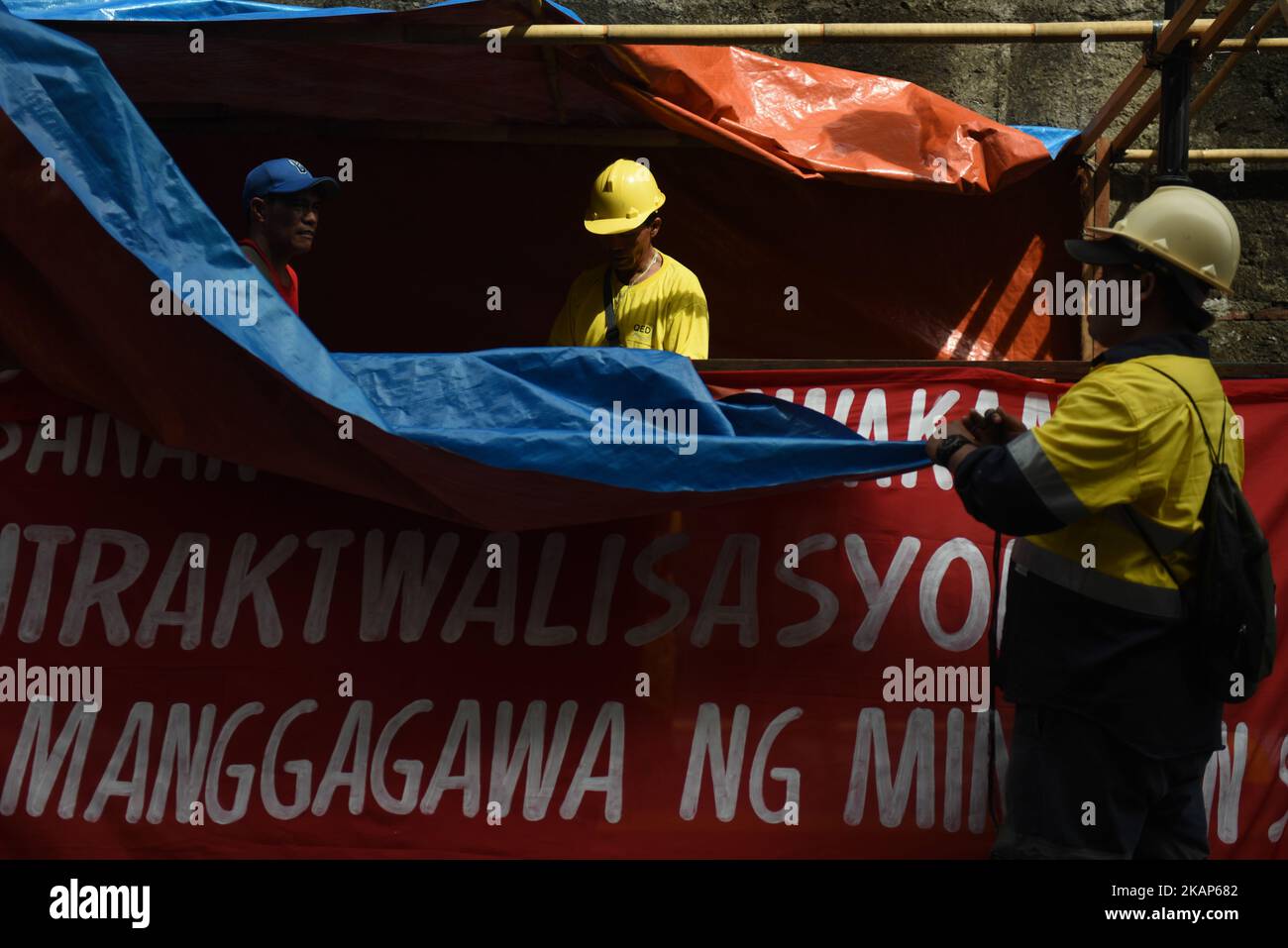 Miners from the CARAGA region in Mindanao set up their tents in front ...