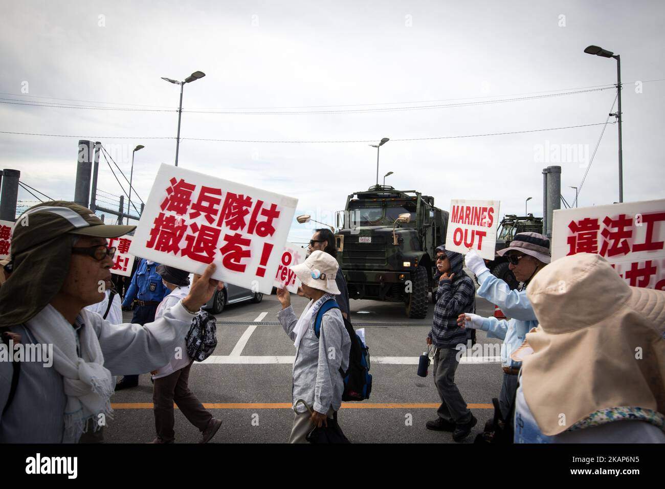 Anti-US base protesters with their placards stage a rally in front of ...