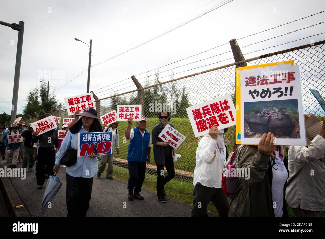 Anti-US base protesters with their placards stage a rally in front of ...