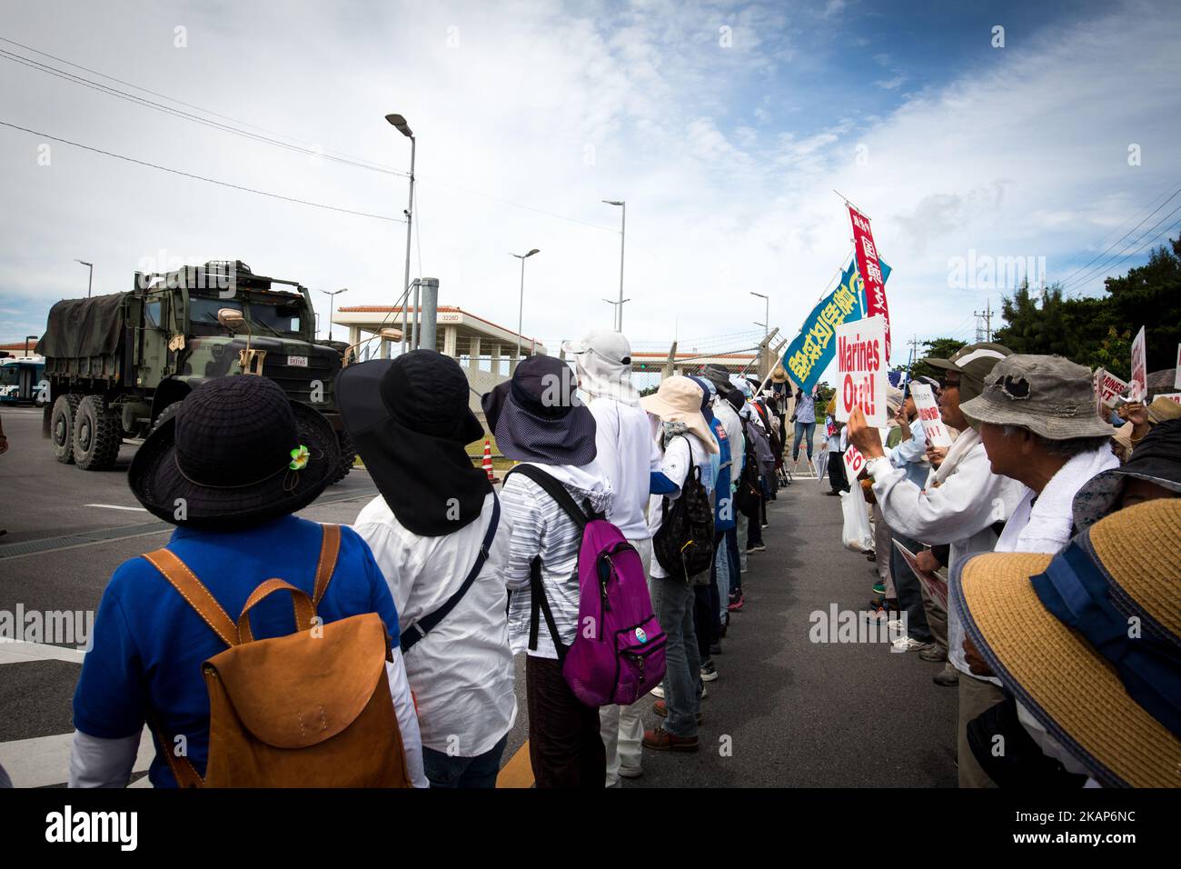 Anti-US base protesters with their placards stage a rally in front of ...
