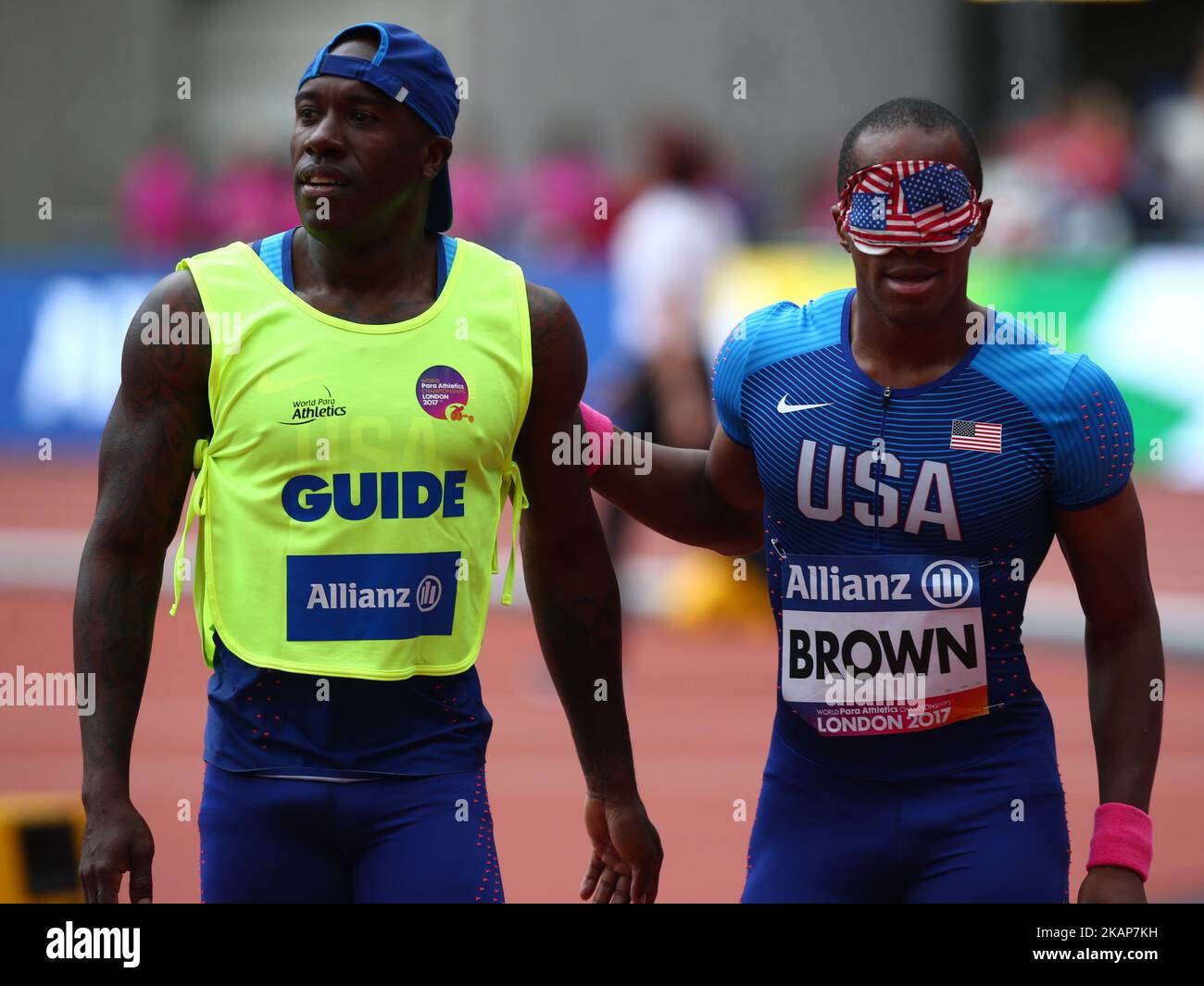 David Brown of USA and Guide Jerome Avery Men's 100m T11 Round 1 Heat 3 ...