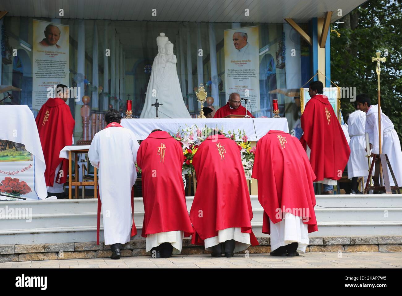 Tamil Catholic priests perform prayers during the Feast of Our Lady of ...