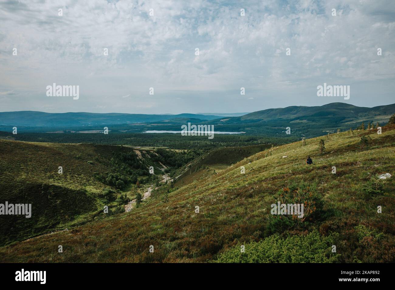 A beautiful green landscape of the hillside with the cloudy sky Stock ...