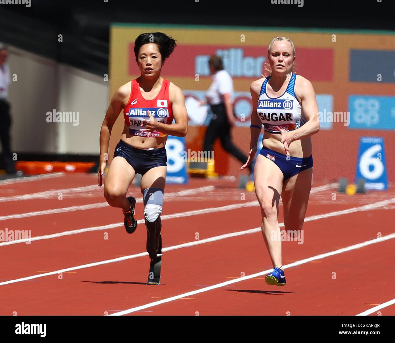 l-r Saki Takakuwa (JPN) and Laura Sugar (GBR) compete in Women's 100m ...