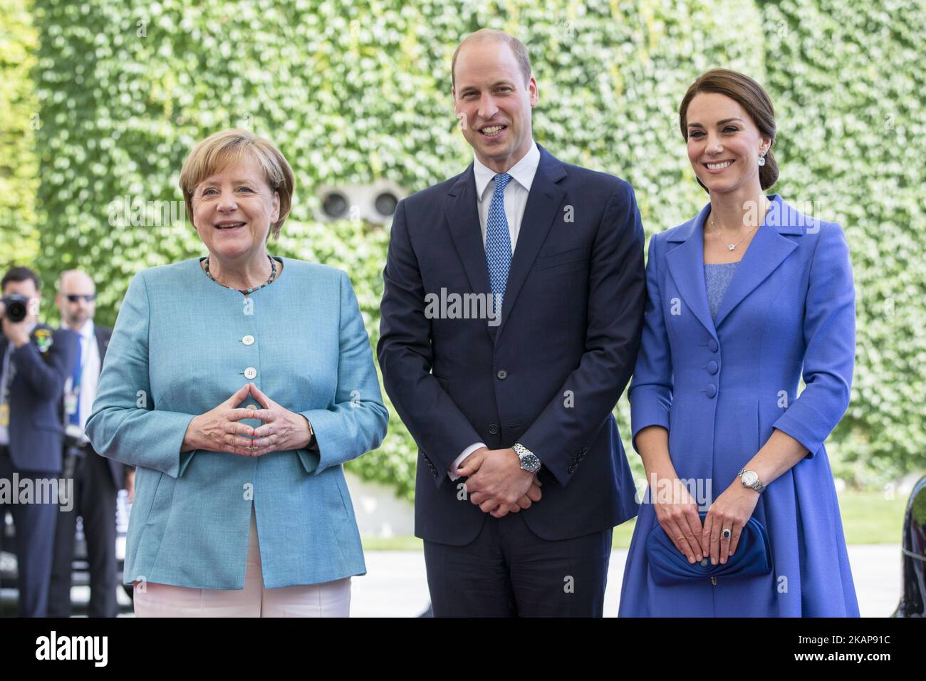 German Chancellor Angela Merkel greets Britain's Prince William, Duke ...