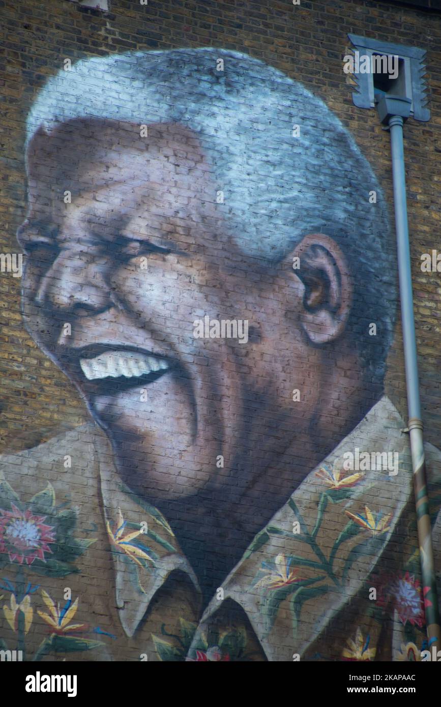 A giant portrait of Nelson Mandela is seen on a wall of Camden, London ...