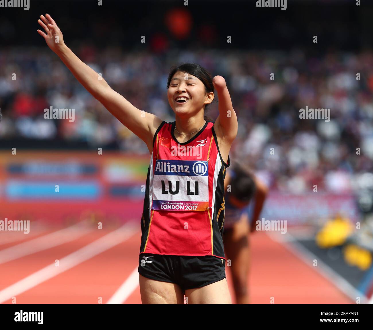 Lu Li of China celebrate her win in Woman's 400m T47 Final during World ...