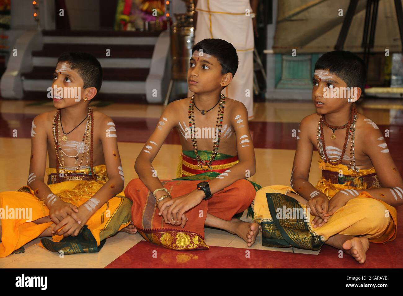 Tamil Hindu boys in training to become Hindu priests listen as a senior ...