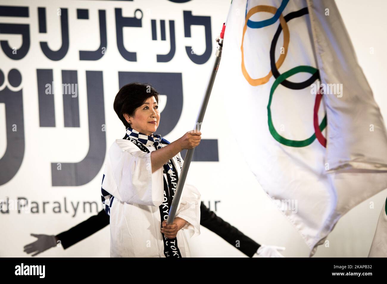 Tokyo Gov. Yuriko Koike carries an Olympic flag during the Tokyo 2020 ...