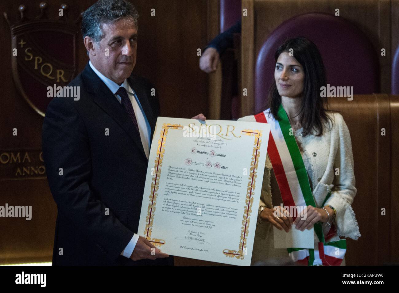 The Mayor of Rome, Virginia Raggi, (R) awards the Honorary Citizenship ...