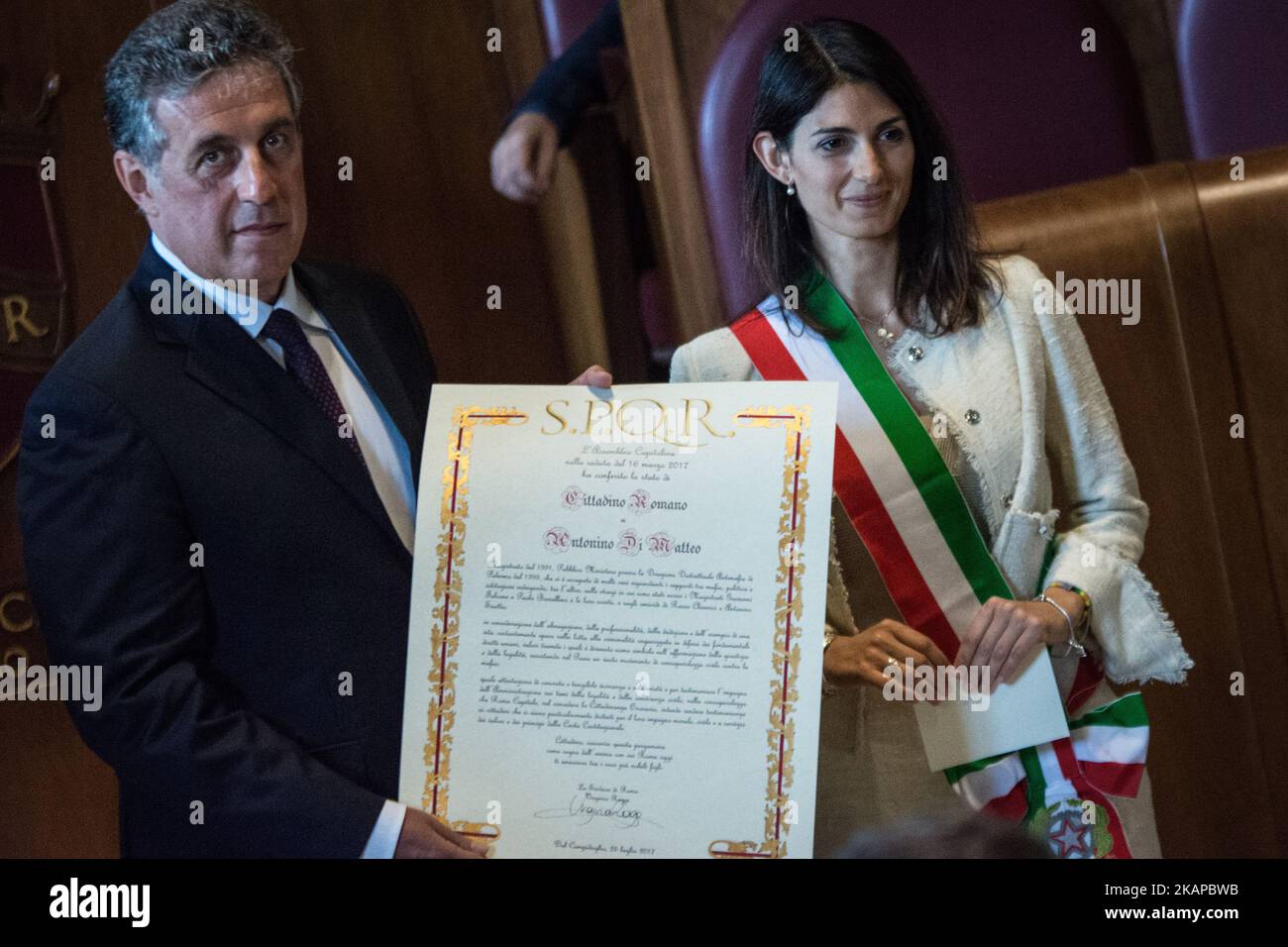 The Mayor of Rome, Virginia Raggi, (R) awards the Honorary Citizenship ...