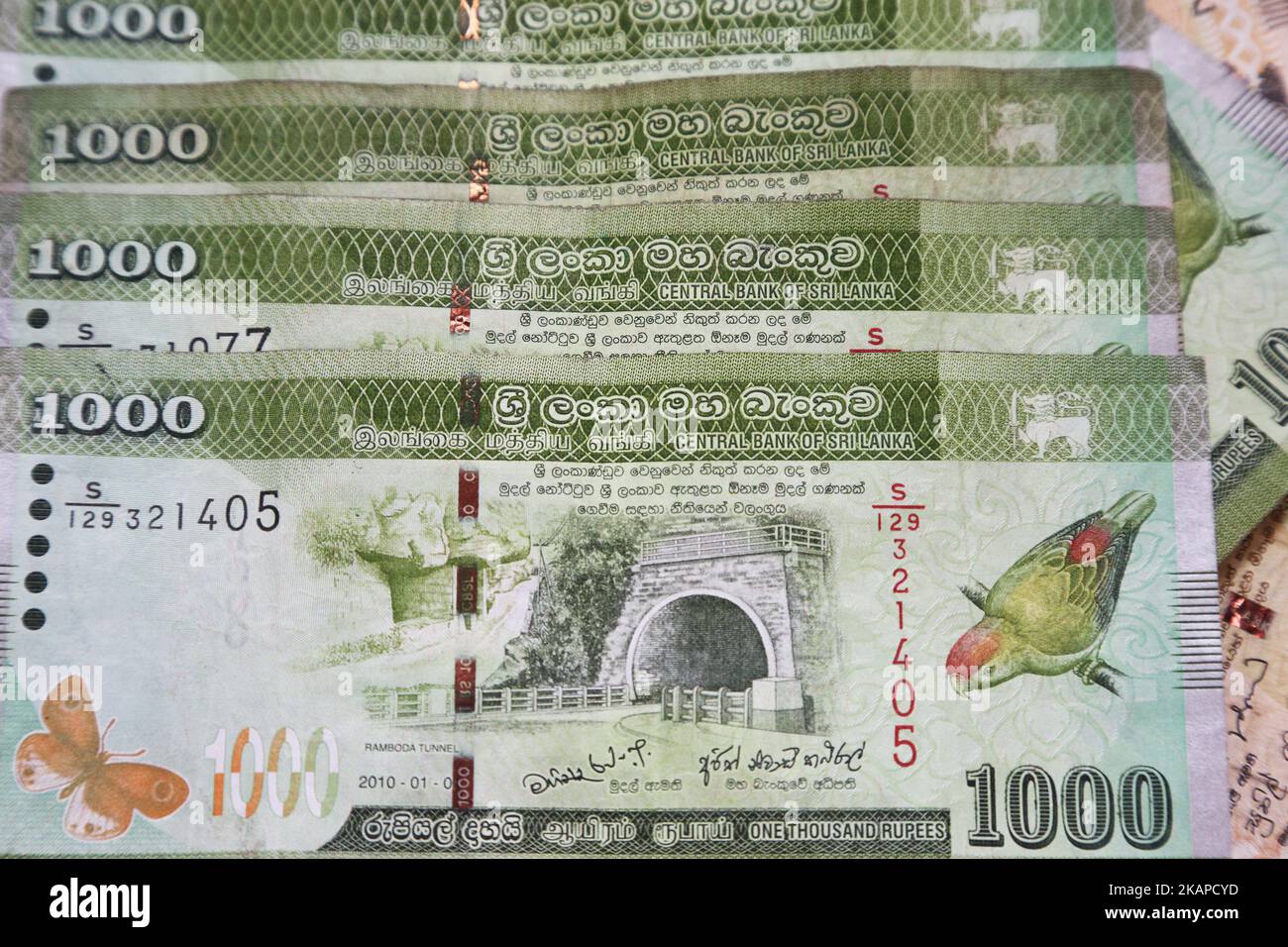 Assortment of Sri Lankan rupee banknotes. (Photo by Creative Touch ...