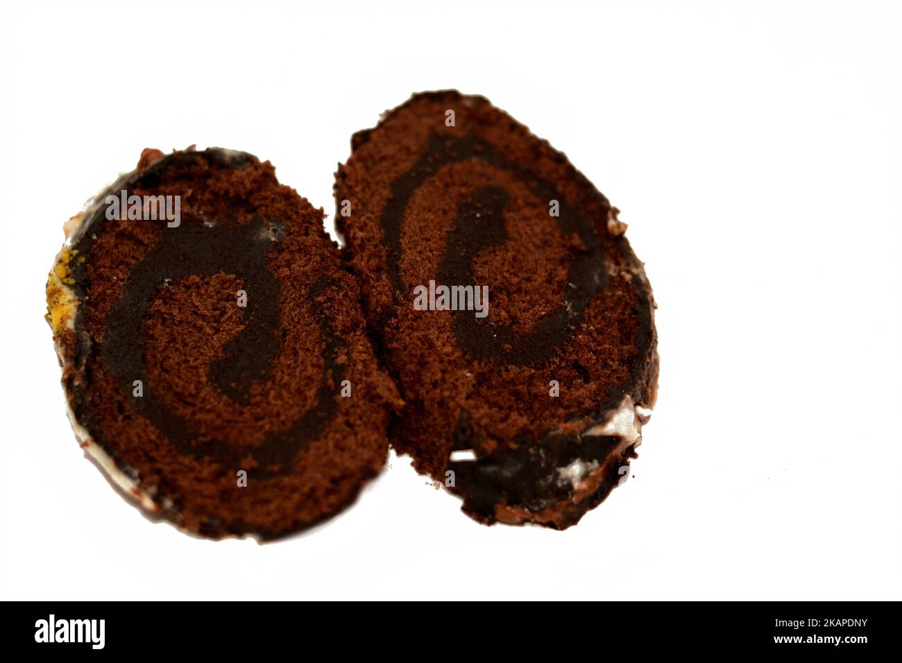 A chocolate cake roll Swiss roll, combination of light chocolate sponge ...