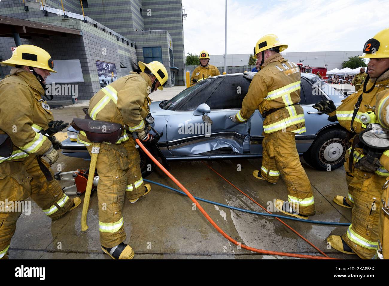 Graduates of the Los Angeles Fire Department Academy during a ...