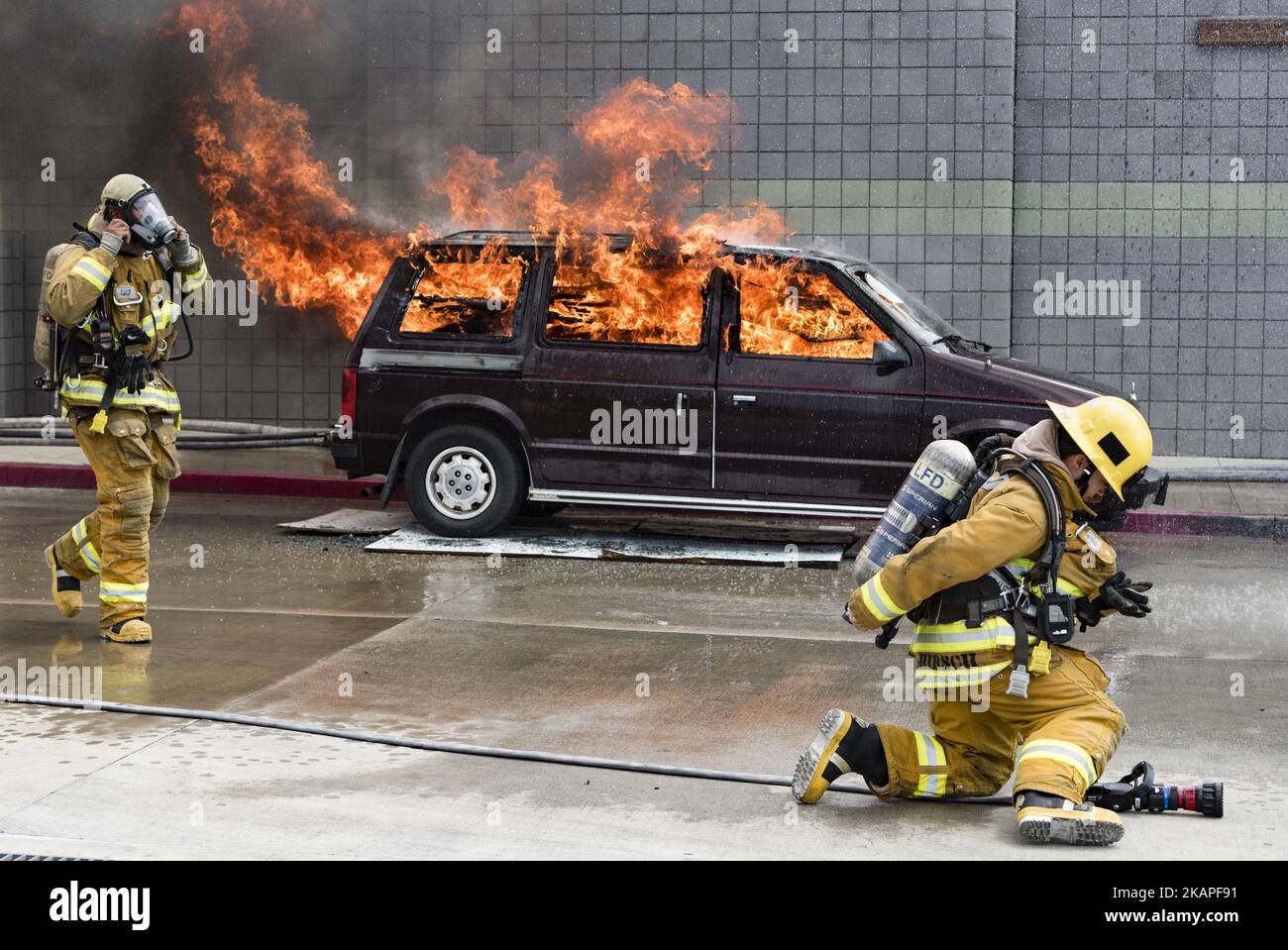 Graduates of the Los Angeles Fire Department Academy during a ...