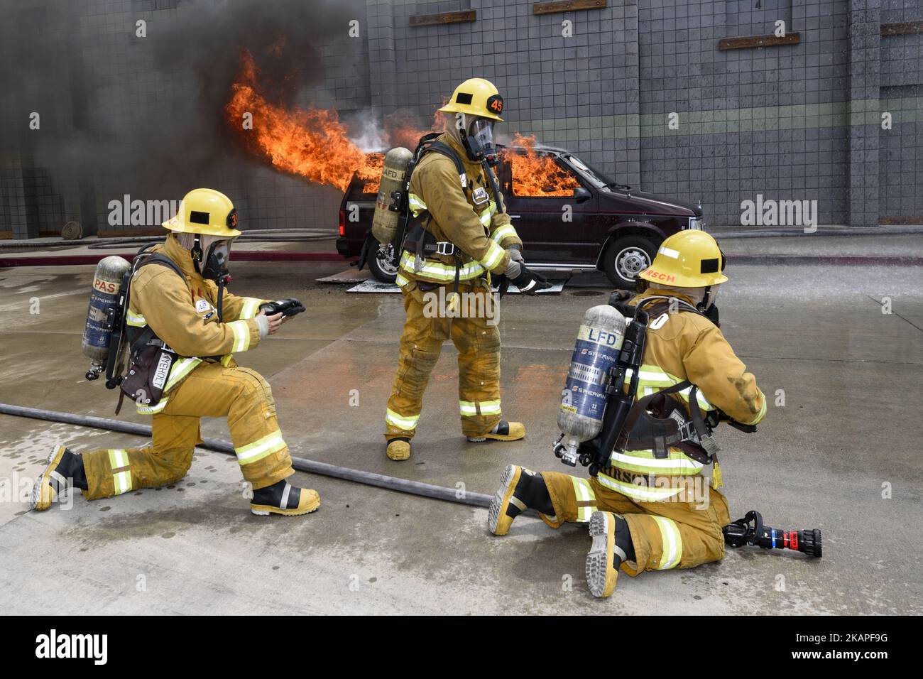 Graduates of the Los Angeles Fire Department Academy during a ...