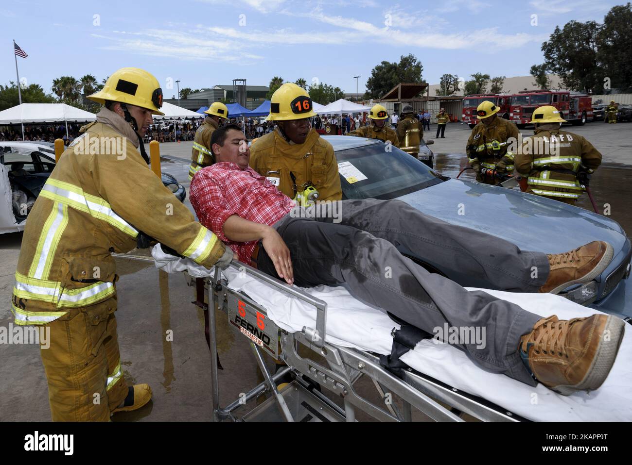 Graduates of the Los Angeles Fire Department Academy during a ...