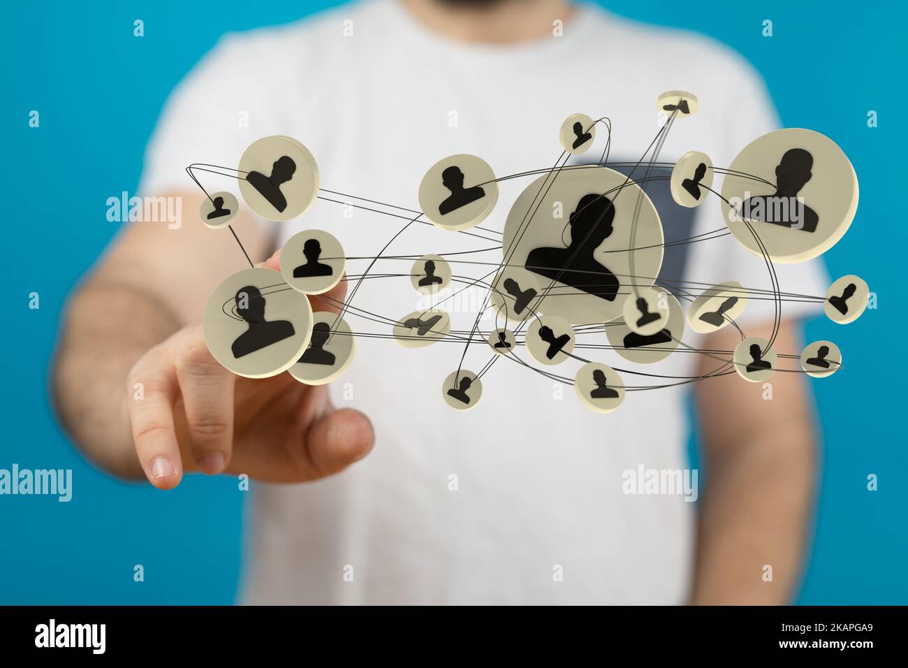 A man touching 3D rendered people signs Stock Photo - Alamy