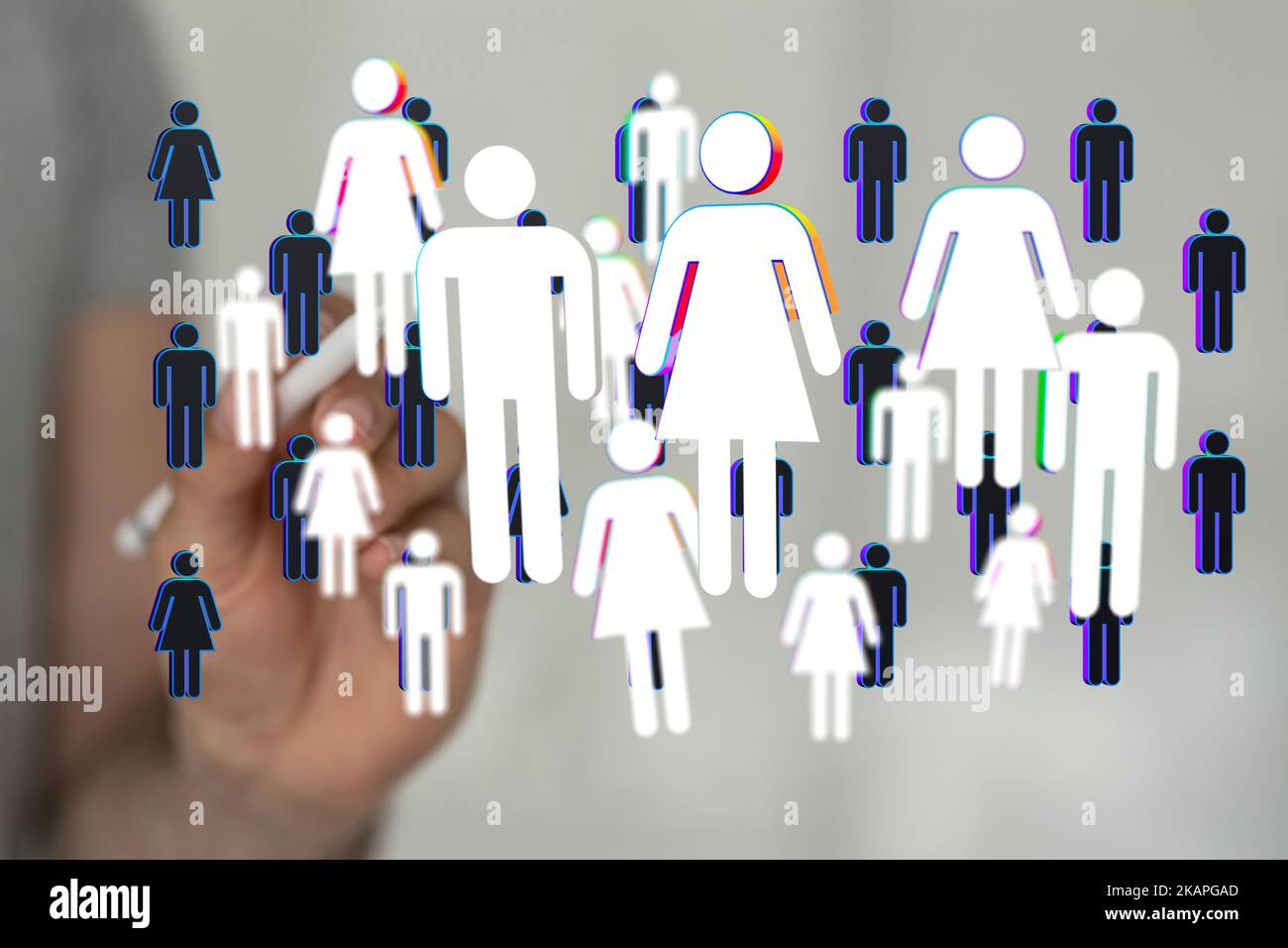 A man touching 3D rendered people signs Stock Photo - Alamy