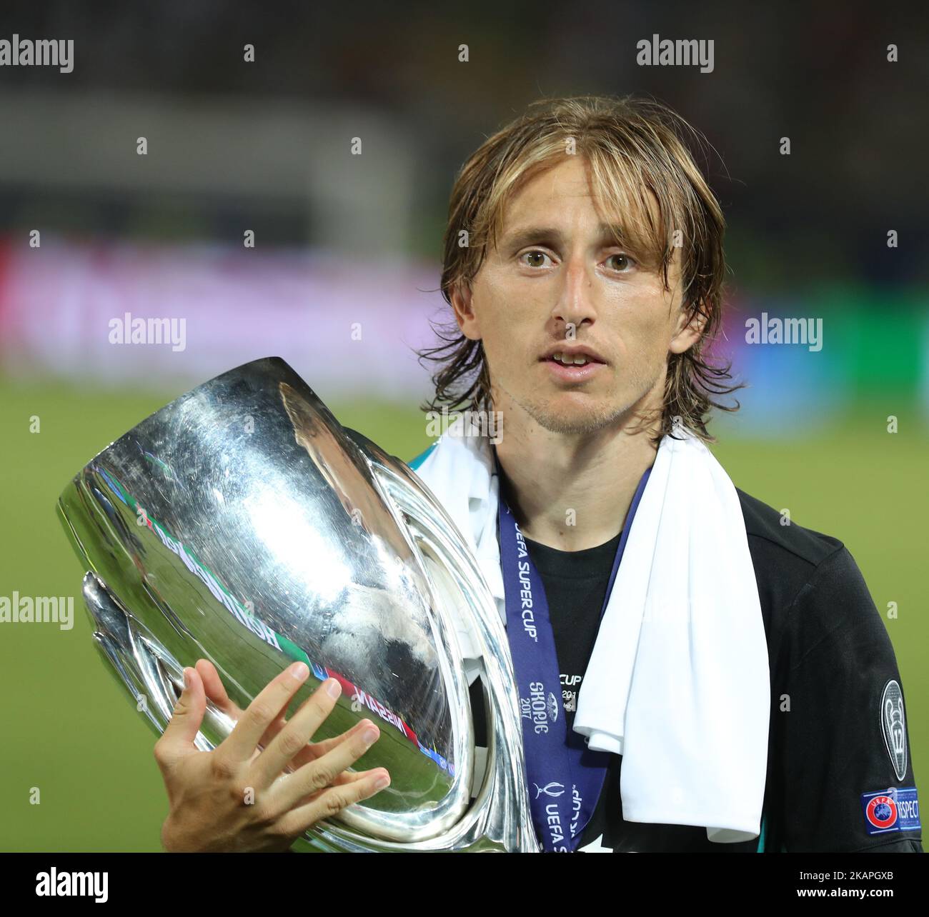 Luka Modric of Real Madrid poses for a picture with his trophy after ...